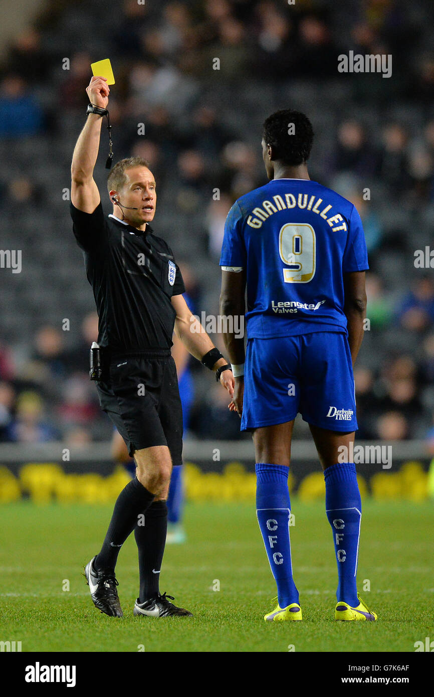 Referee stephen martin shows chesterfields armand gnanduillet the ...