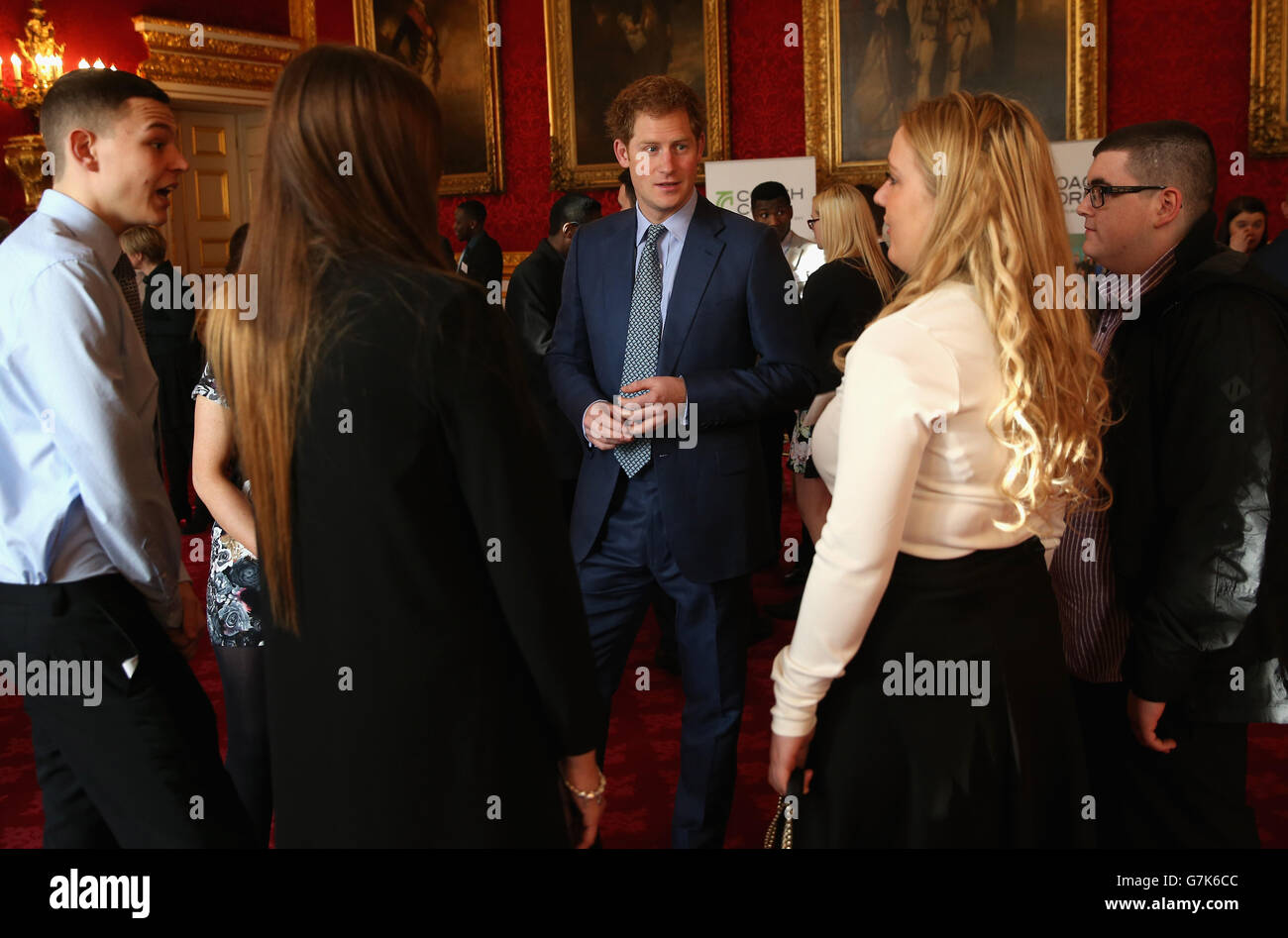 Prince Harry chats with Coach Core graduates during a Coach Core ...