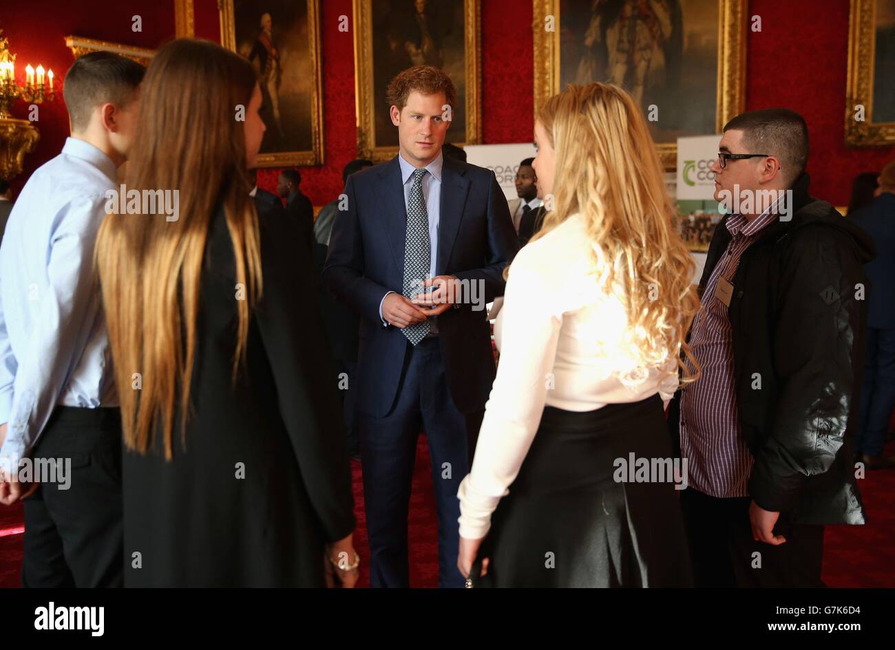 Prince Harry chats with Coach Core graduates during a Coach Core ...