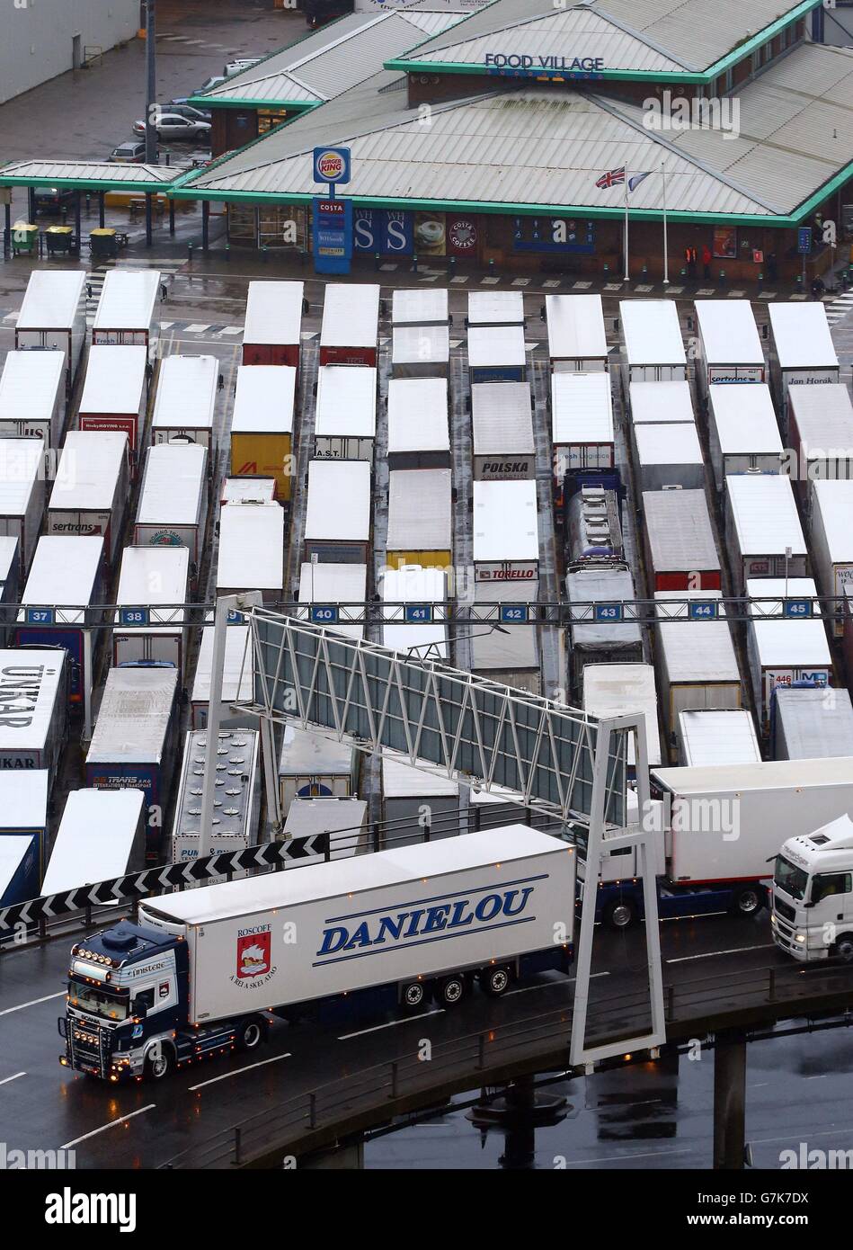 Lorries queue to board ferries at The Port of Dover in Kent, as bad ...