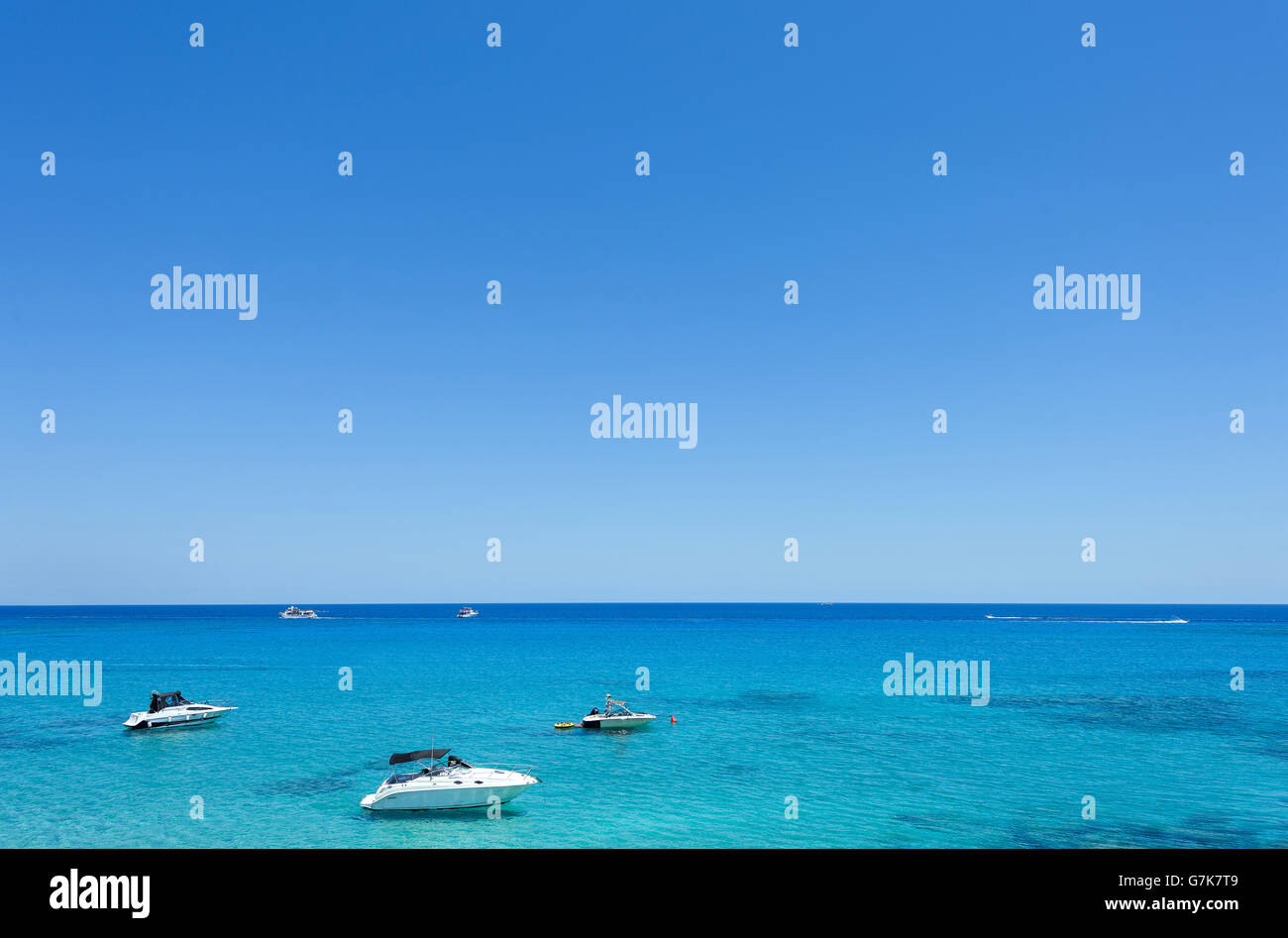 Photo of sea in protaras, cyprus island with boats and immaculate water ...