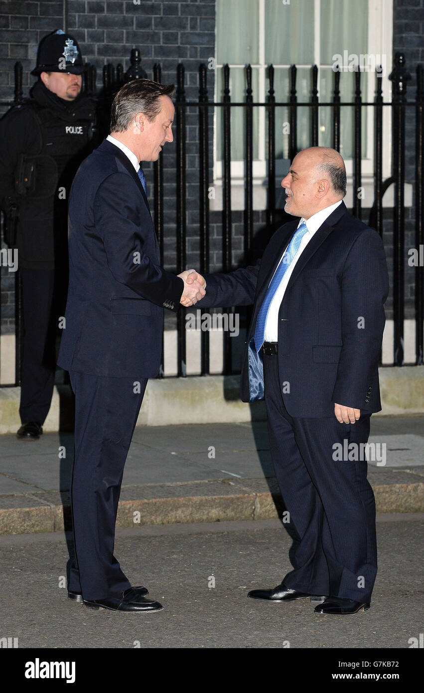 The Prime Minister David Cameron shakes hands with Mr Haider al-Abadi ...