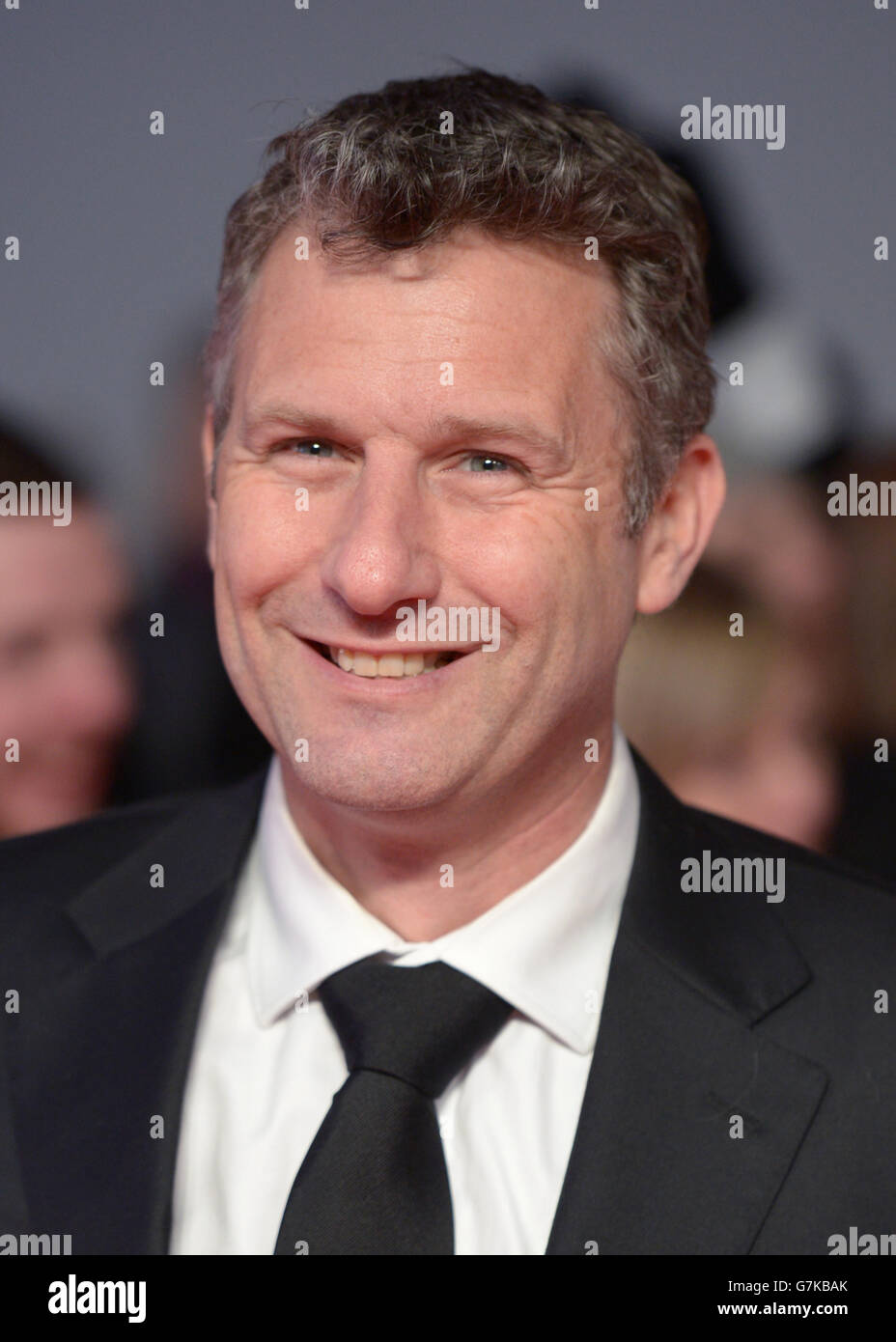Adam hills arriving national television awards o arena hi-res stock ...