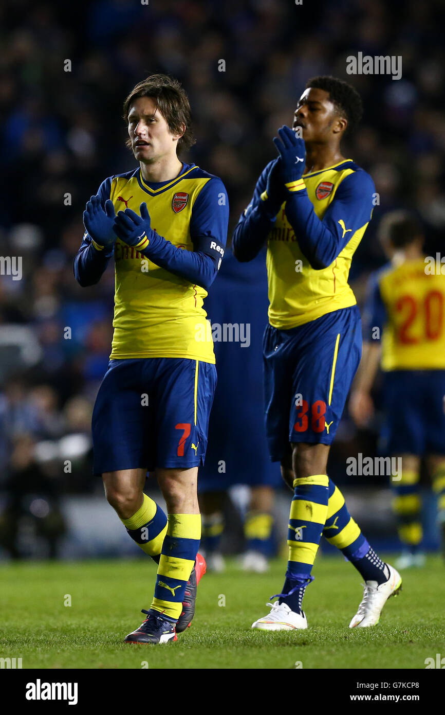 Arsenal's Tomas Rosicky and Chupa Akpom (right) celebrate at the end of ...