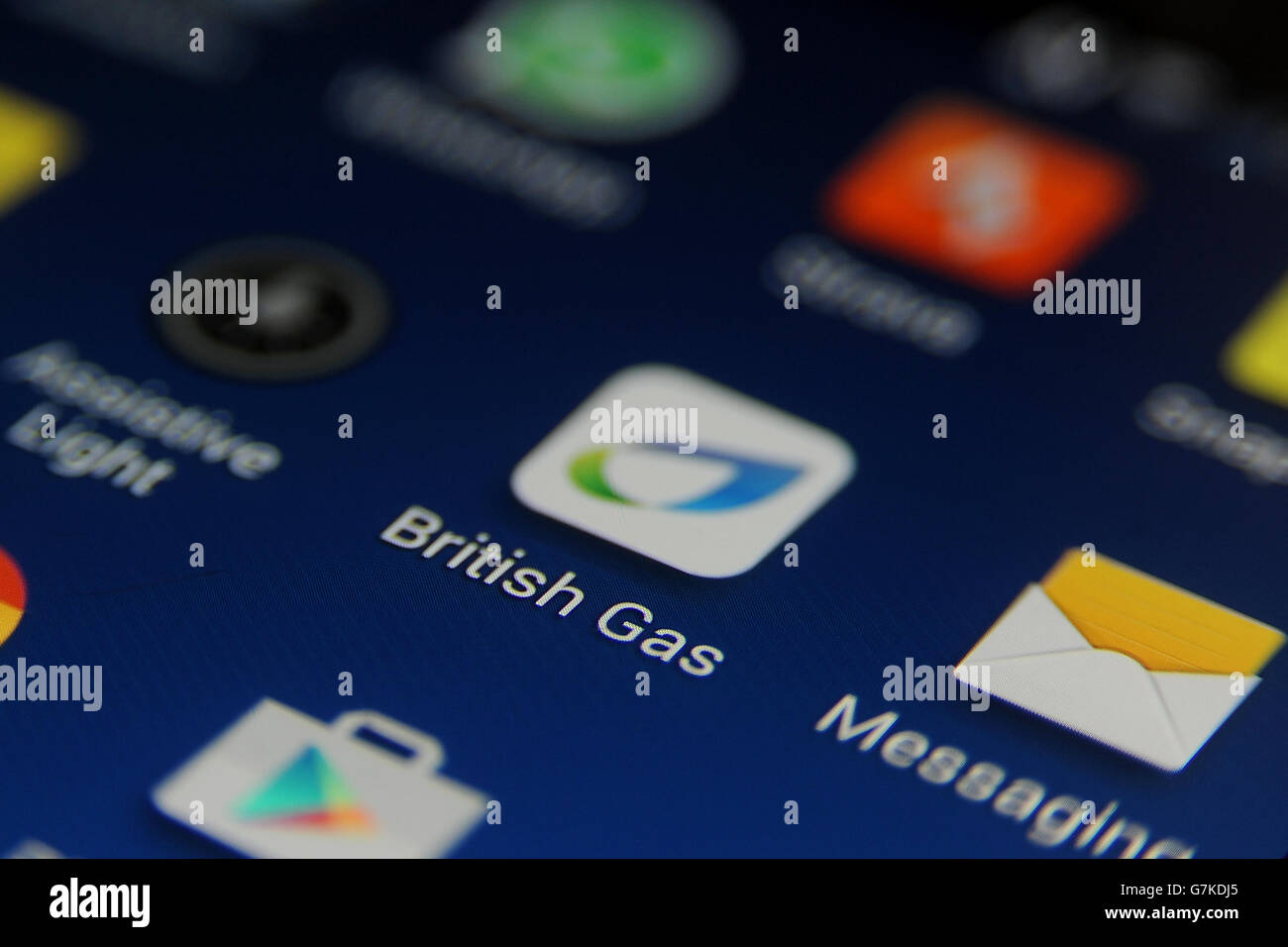 A smartphone displays the british gas app hi-res stock photography and ...