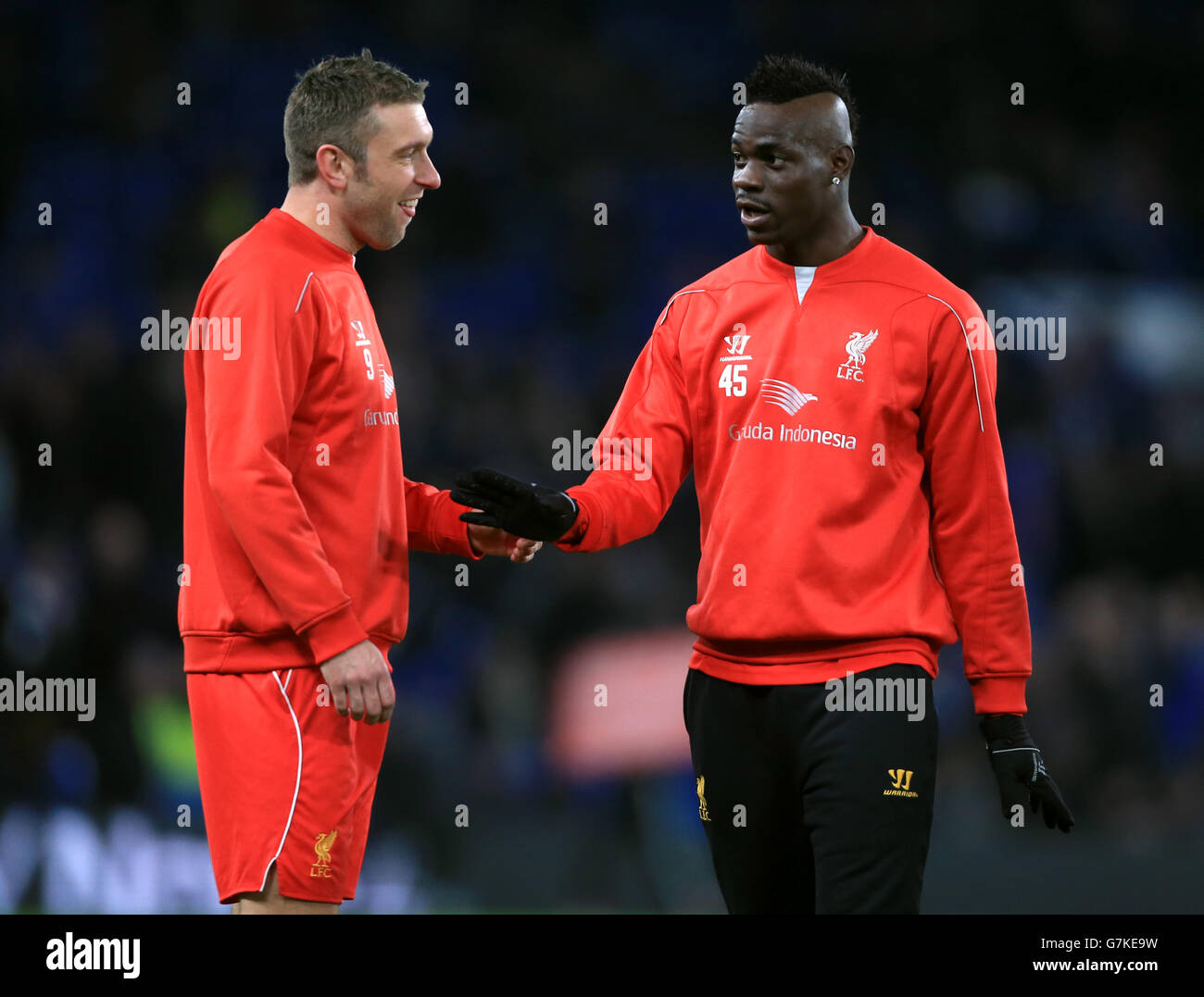 Liverpool's Mario Balotelli (right) with Rickie Lambert during the warm ...