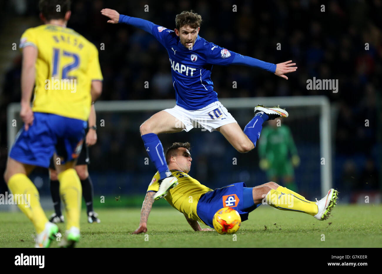 Chesterfield's Jay O'Shea (top) and Crawley Town's Jimmy Smith battle ...