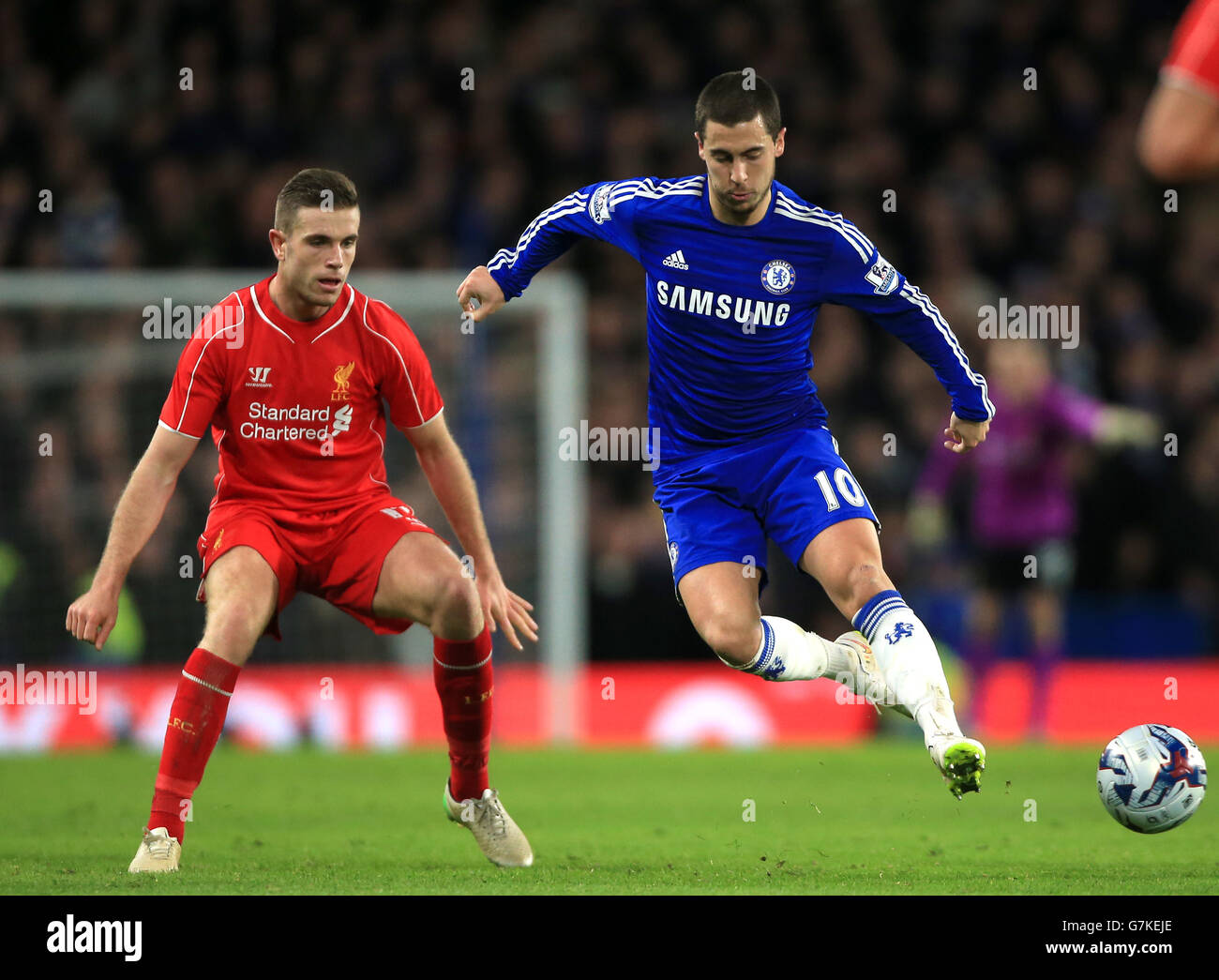 Chelsea's Eden Hazard (right) and Liverpool's Jordan Henderson battle ...