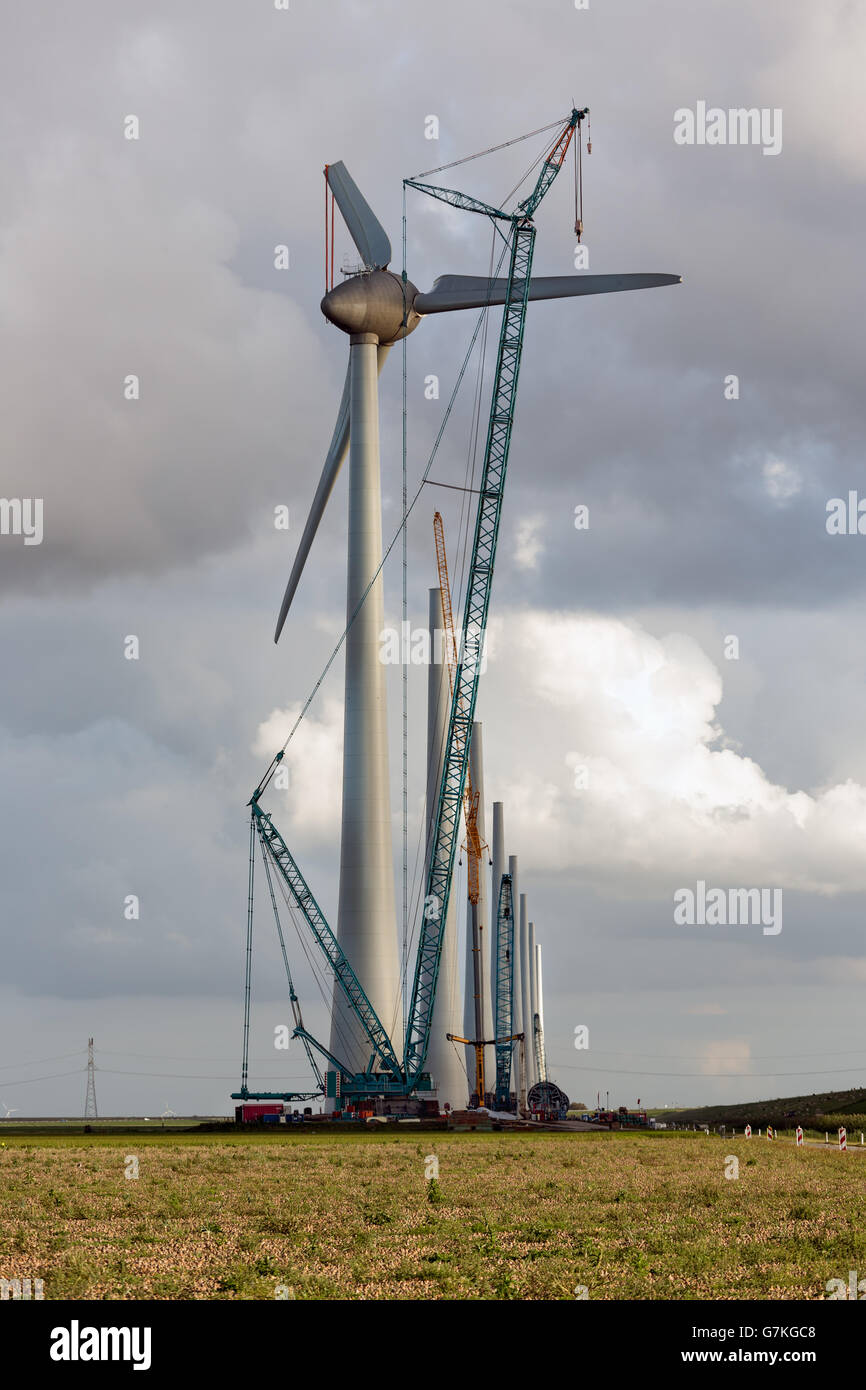 Sunset view at Construction site for building new wind turbines in the ...