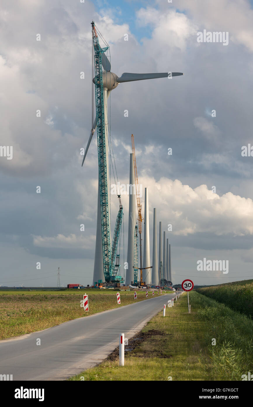 Sunset view at Construction site for building new wind turbines in the ...