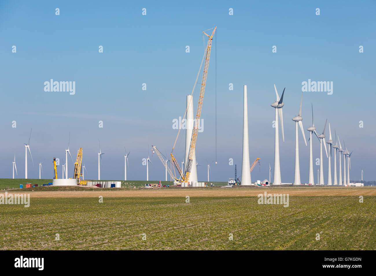 Construction site of new Dutch wind farm in agricultural landscape ...