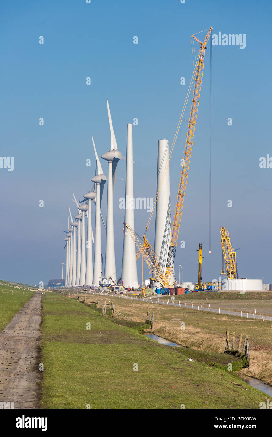 Construction site of new Dutch wind farm in agricultural landscape ...