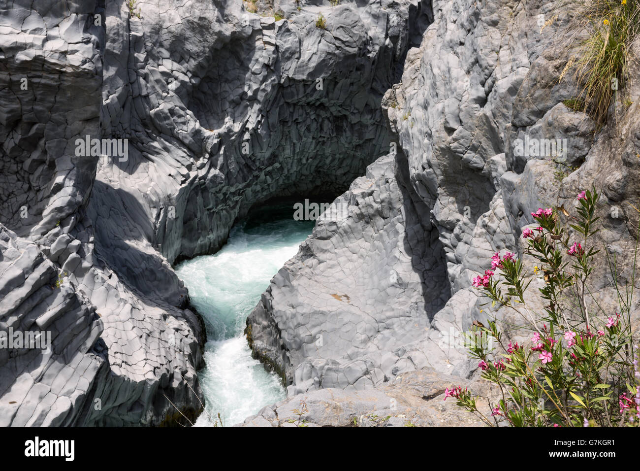 Alcantara gorge with wild flowing river at Sicily, Italy Stock Photo ...