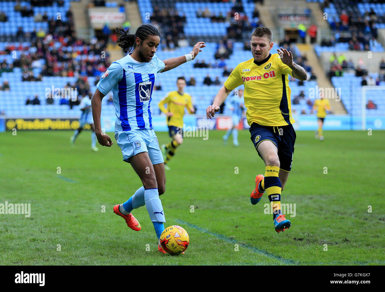Coventry City's Dominic Samuel (left) and Rochdale's Ashley Eastham ...