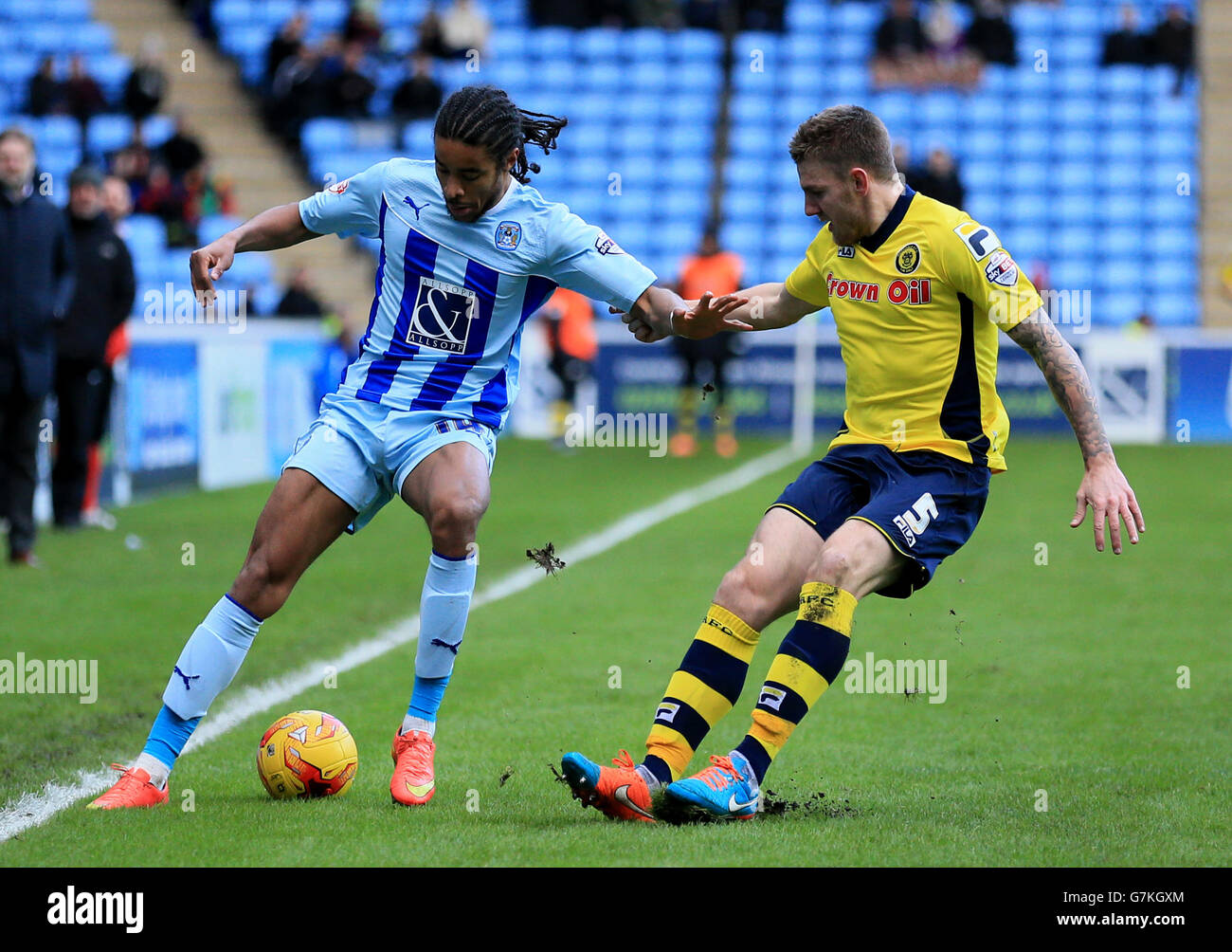 Coventry City's Dominic Samuel (left) and Rochdale's Ashley Eastham ...