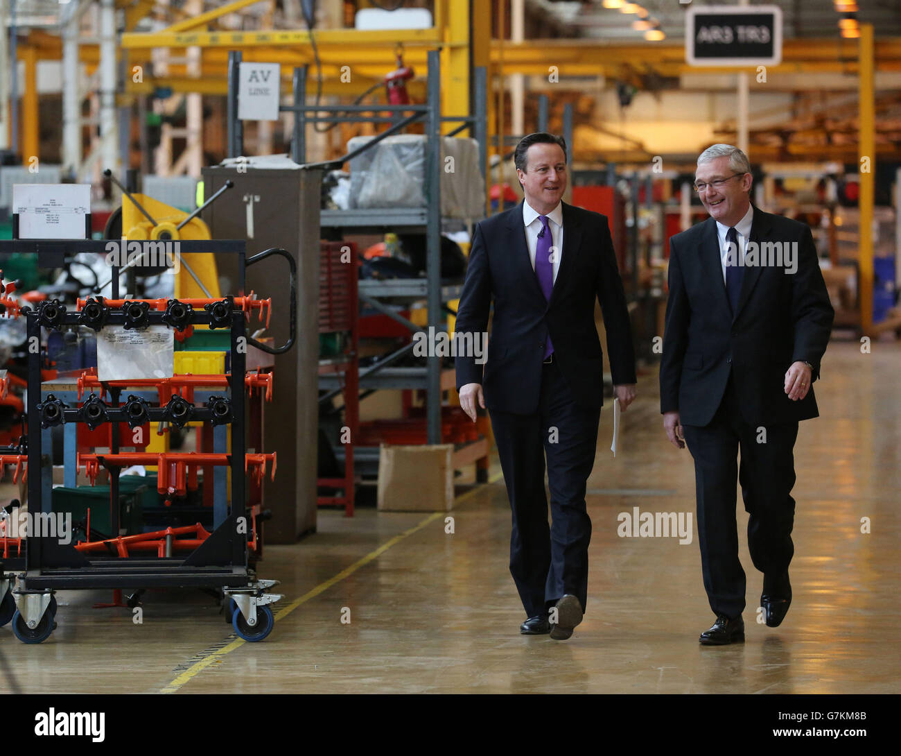 Prime Minister David Cameron is greeted by Ransomes Jacobsen managing ...
