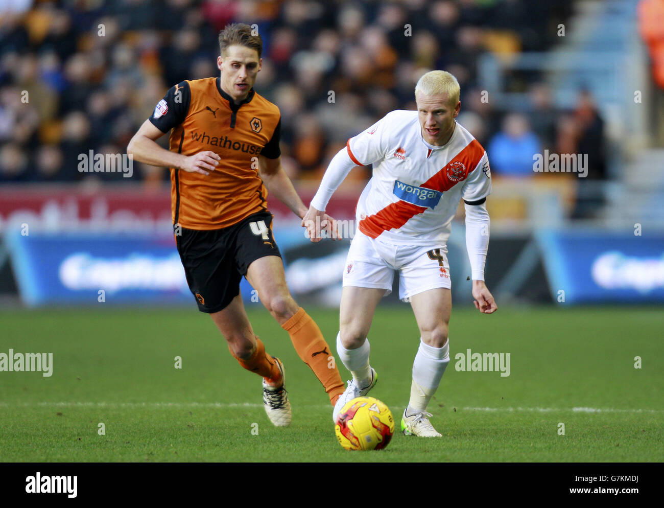 Blackpool's David Perkins (right) in action with Wolverhampton ...