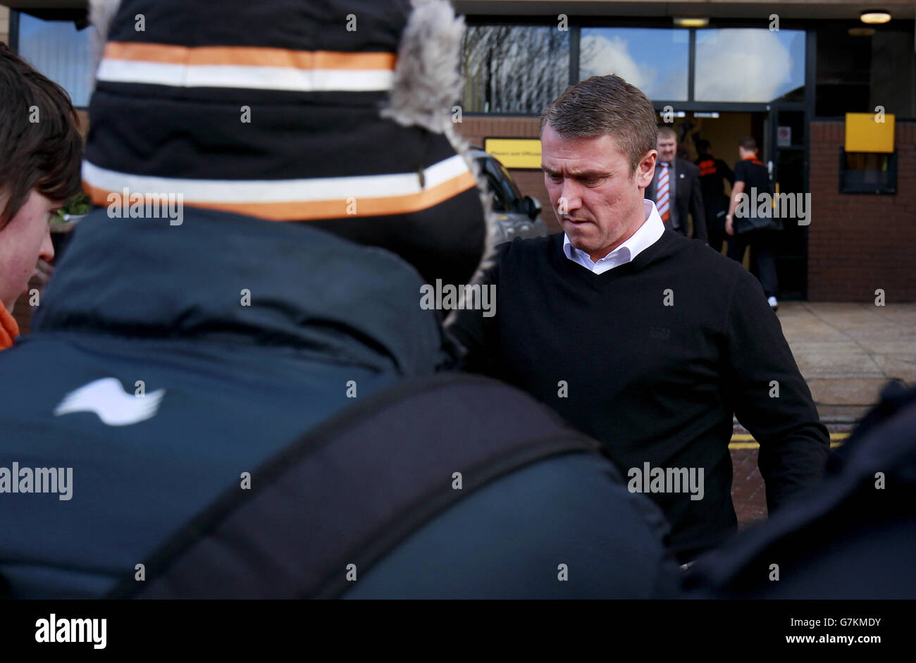 Blackpool manager Lee Clark signs autographs for fans before the game ...