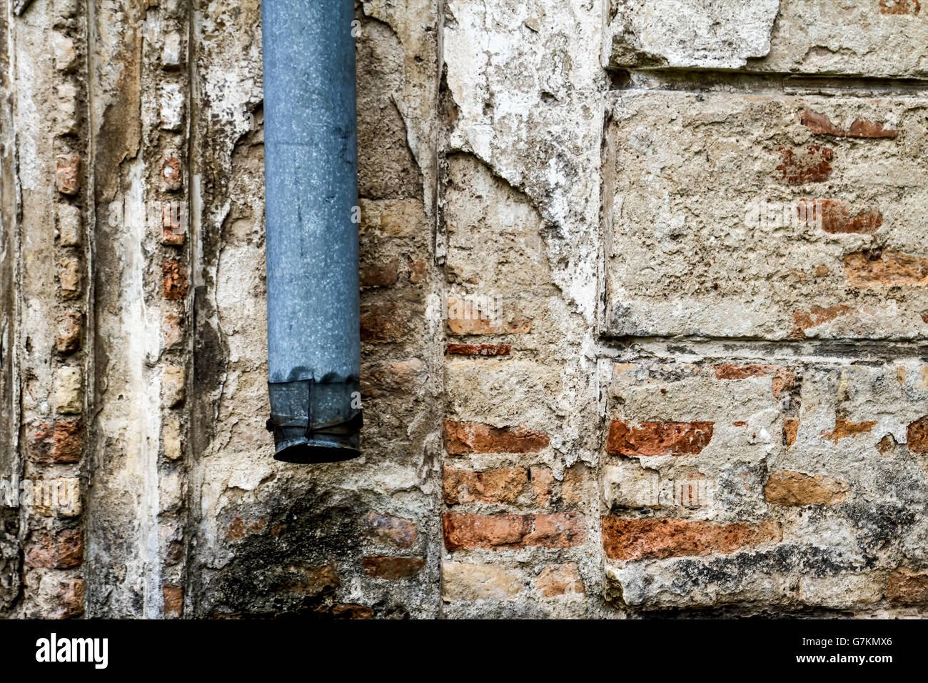 Old brick grunge wall with rain gutters textured background Stock Photo ...