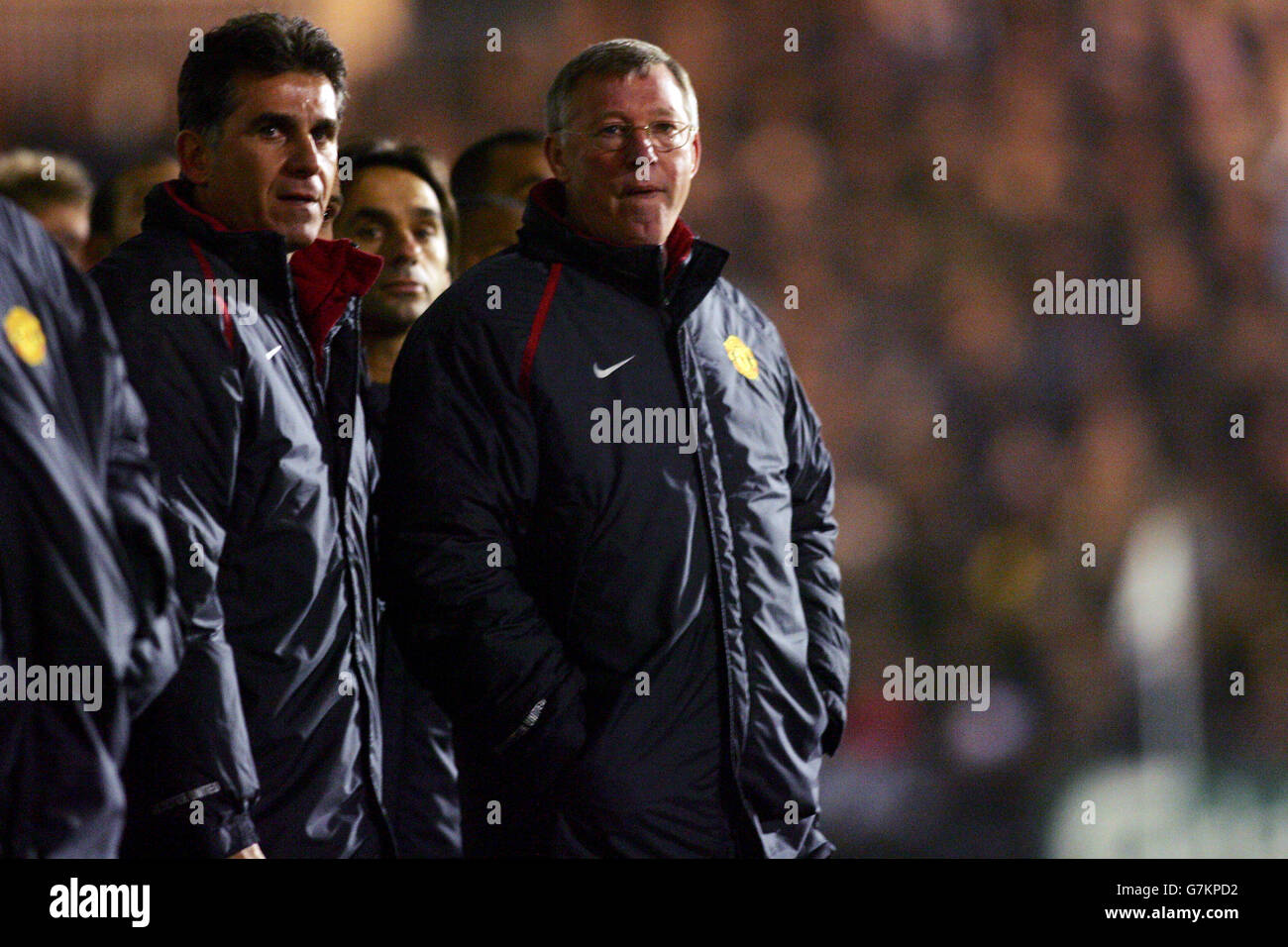 Manchester united manager sir alex ferguson his assistant carlos ...