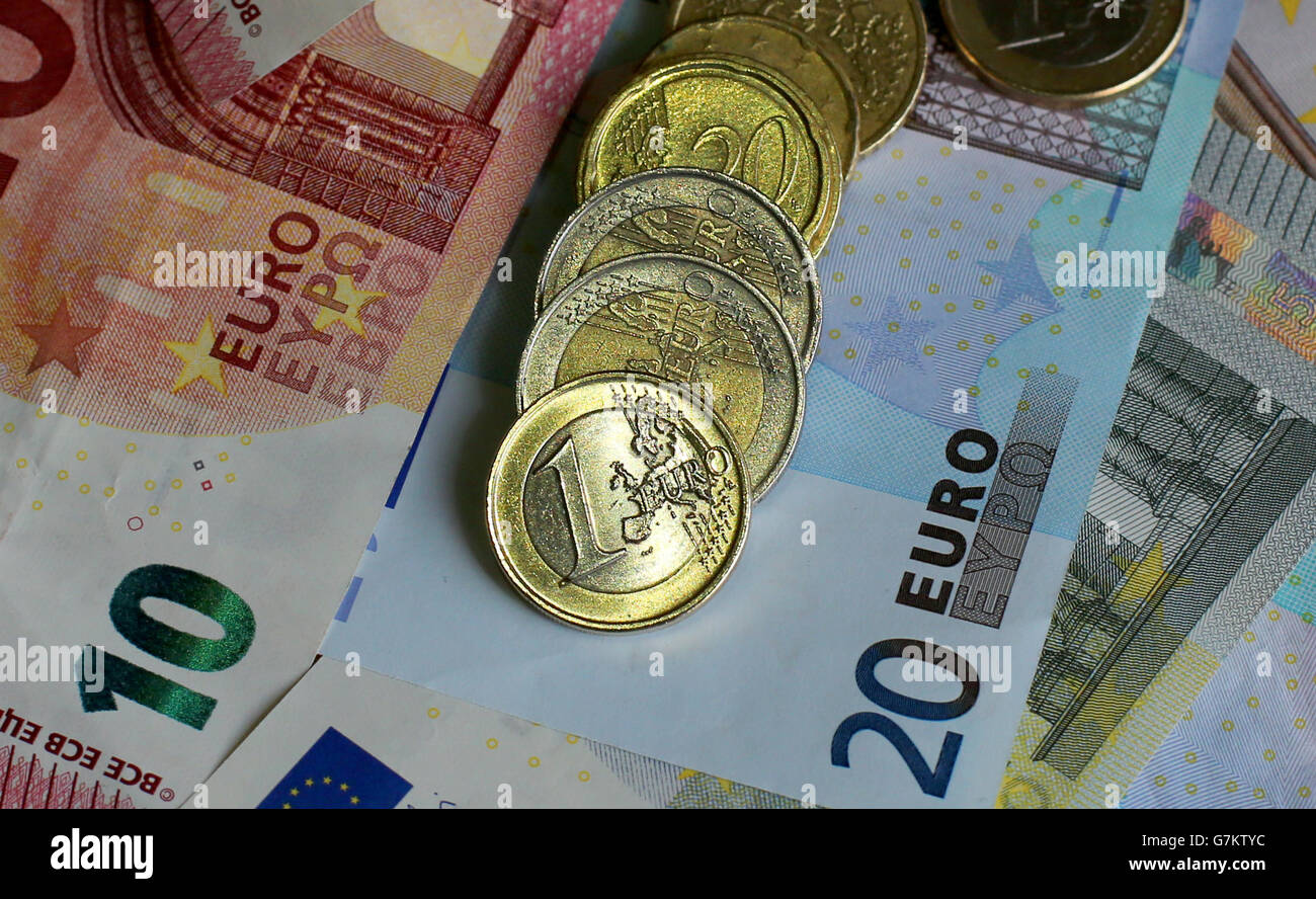 Stock picture of euro notes and coins Stock Photo - Alamy