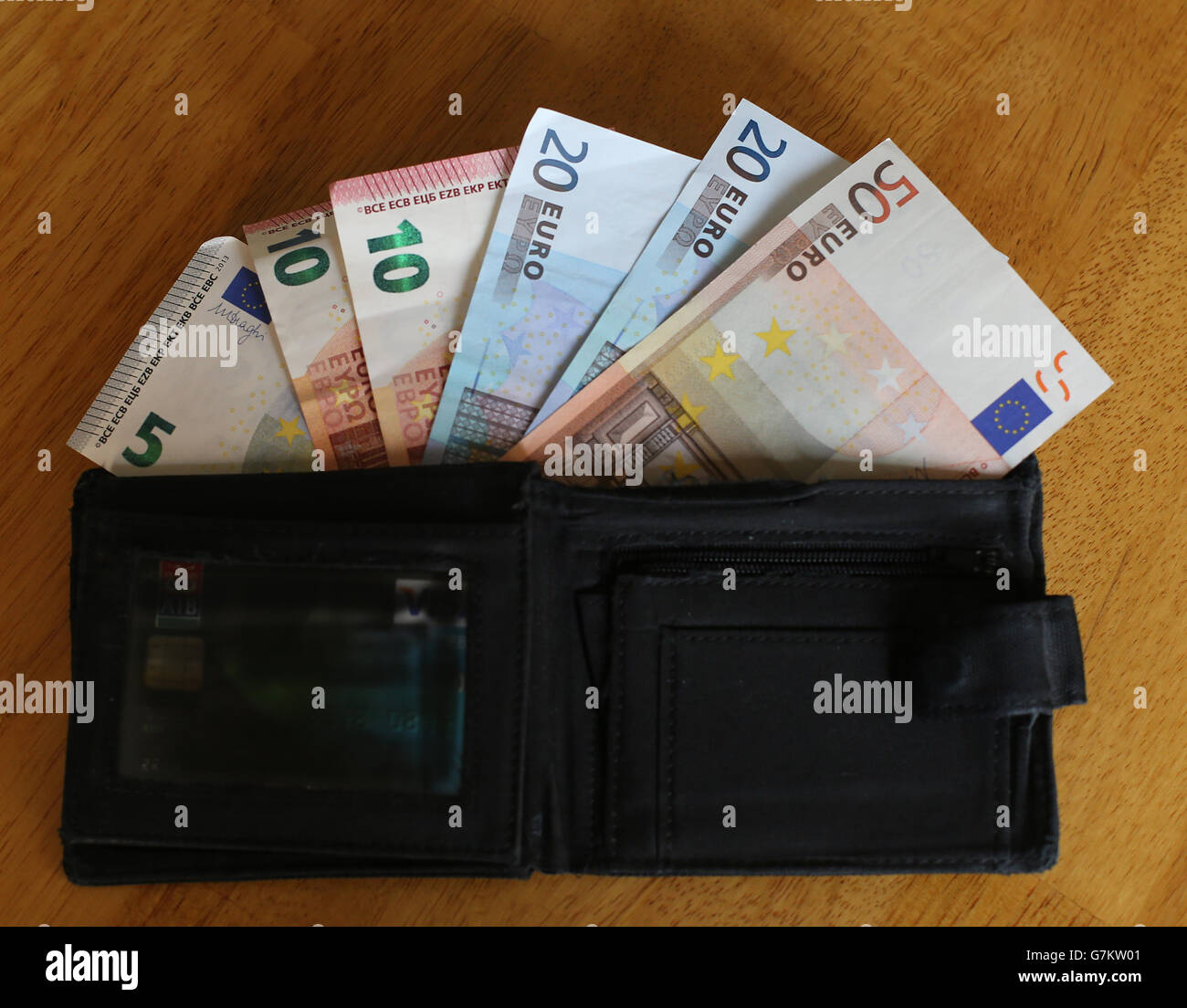 Five euro notes in wallet hi-res stock photography and images - Alamy