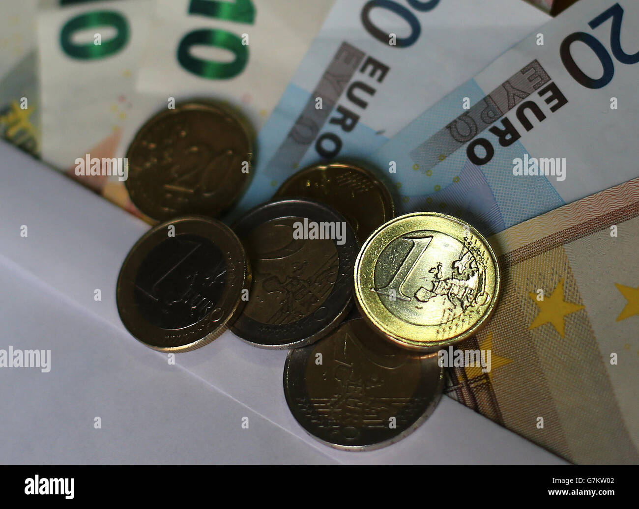 Stock picture of euro notes and coins Stock Photo - Alamy