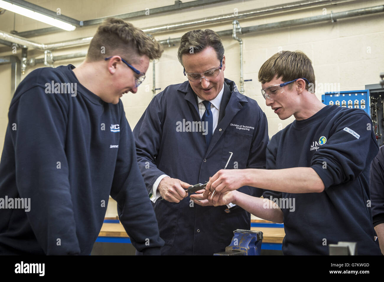 Prime Minister David Cameron helps out with an engineering project in a ...