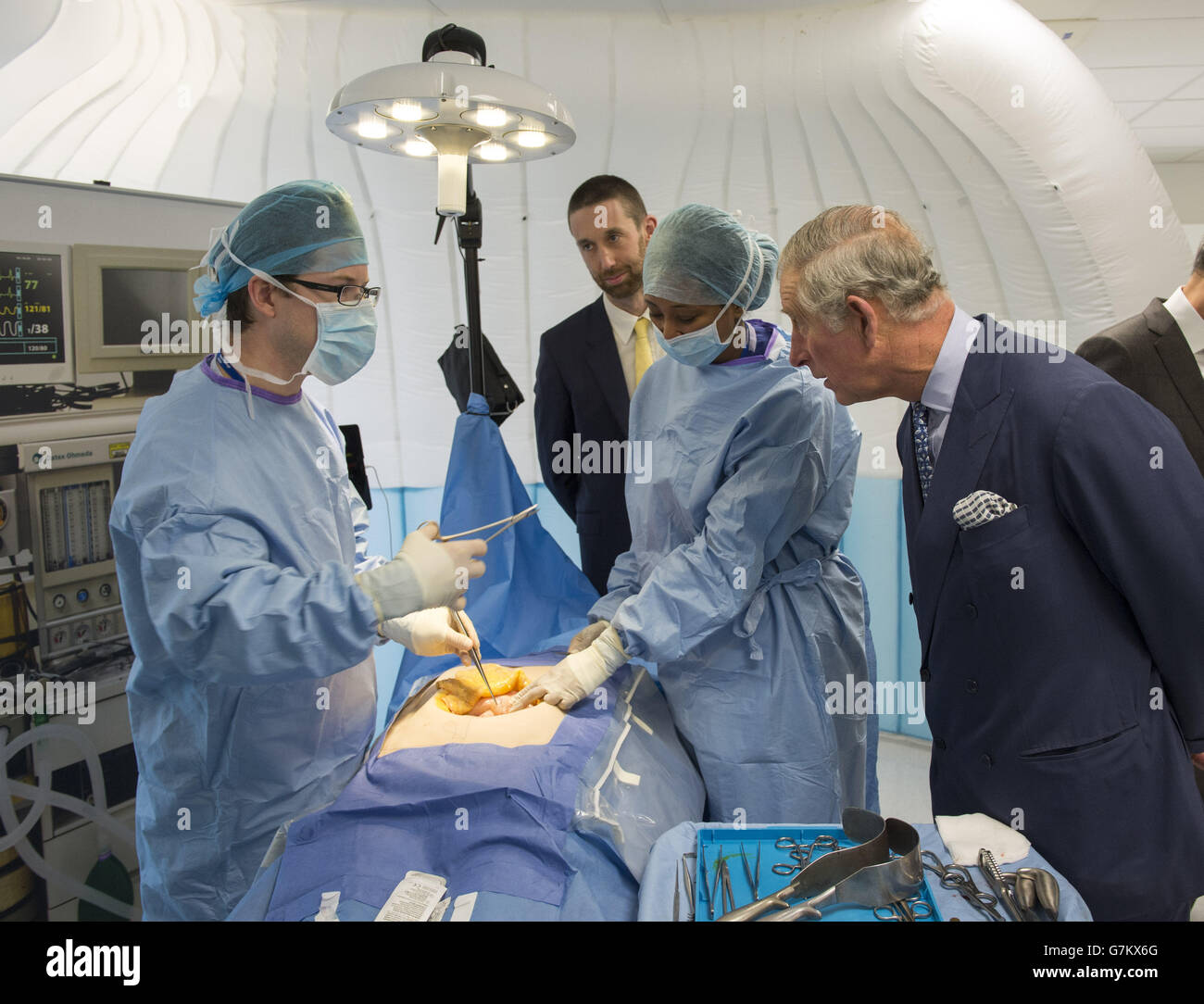 The Prince of Wales is shown a pop-up inflatable operating theatre ...