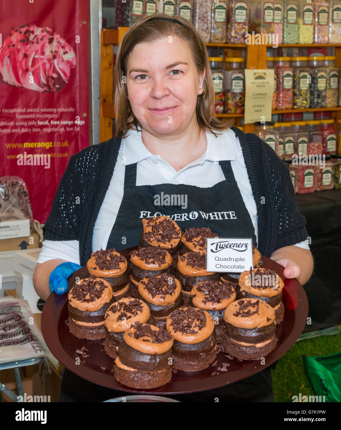 Debbie from Flower and White holding a tray of Tweener cakes at the ...