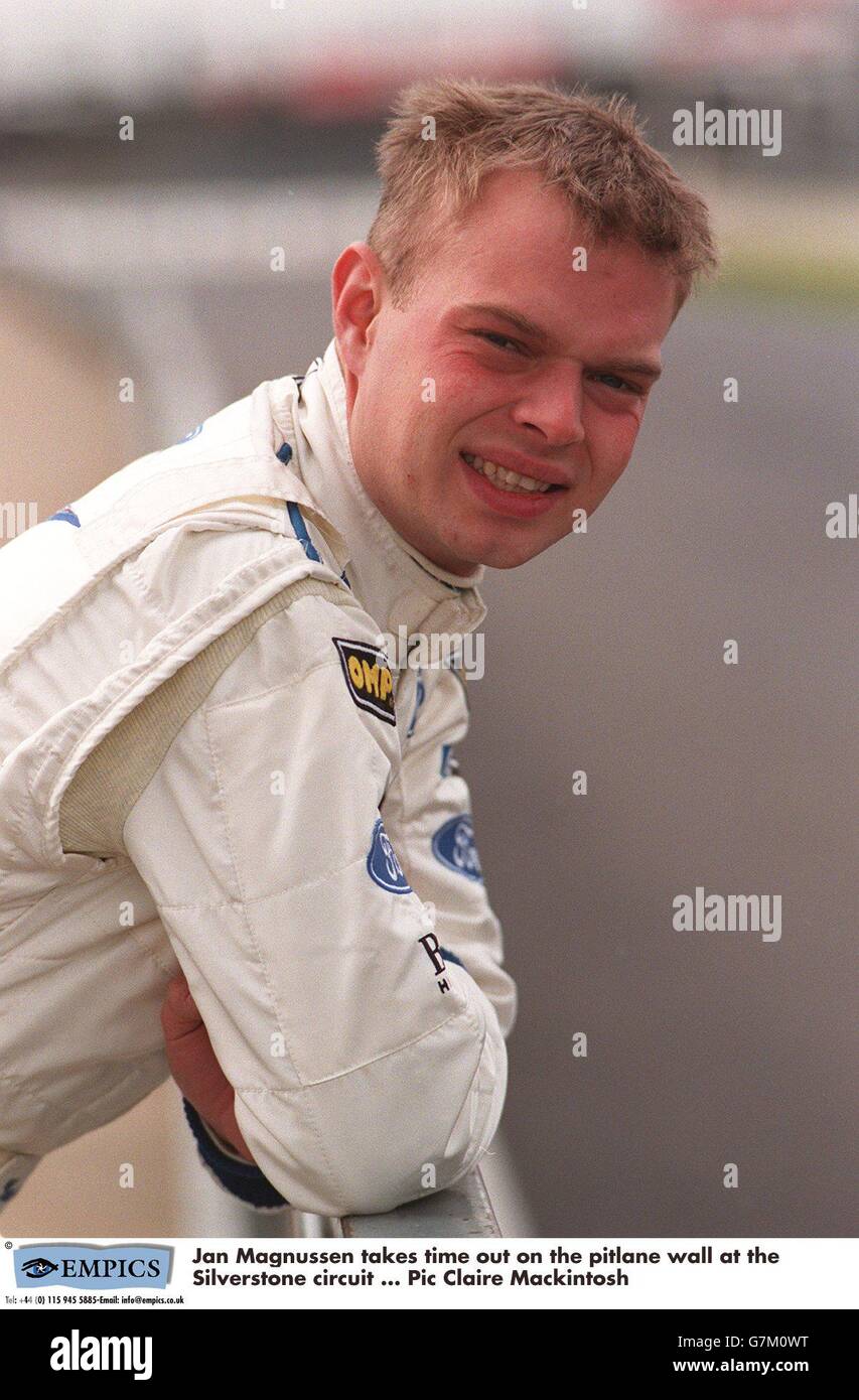 Jan Magnussen takes time out on the pitlane wall at the Silverstone ...