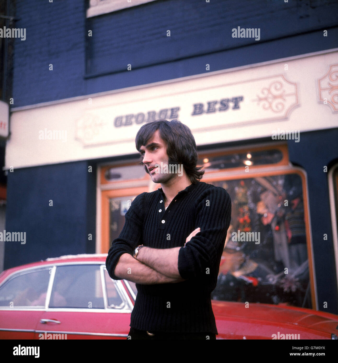 Manchester uniteds george best standing outside his bridge street ...