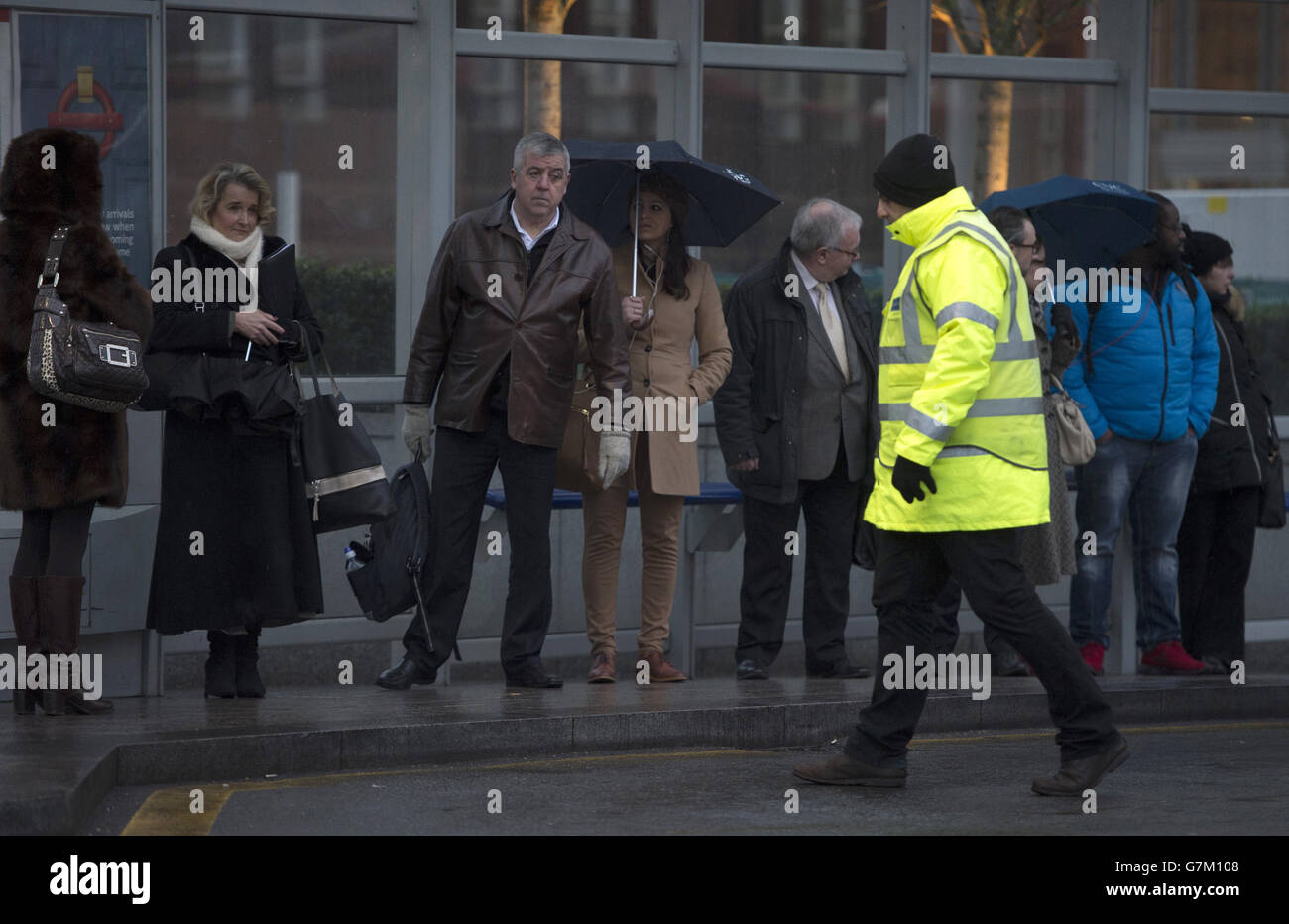 Commuters wait for buses and taxis outside london bridge station hi-res ...