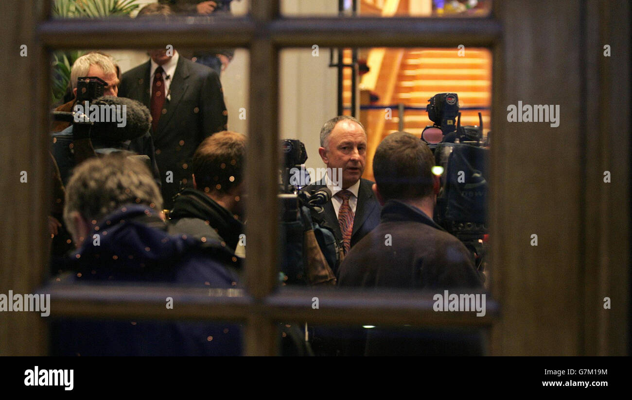 Minister of Foreign Affairs Dermot Ahern(centre) speaks to the press ...