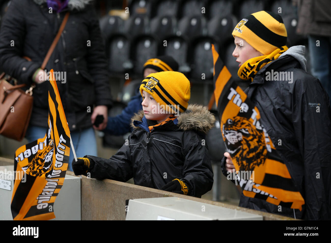 Young hull city fans show their support in the stands hi-res stock ...