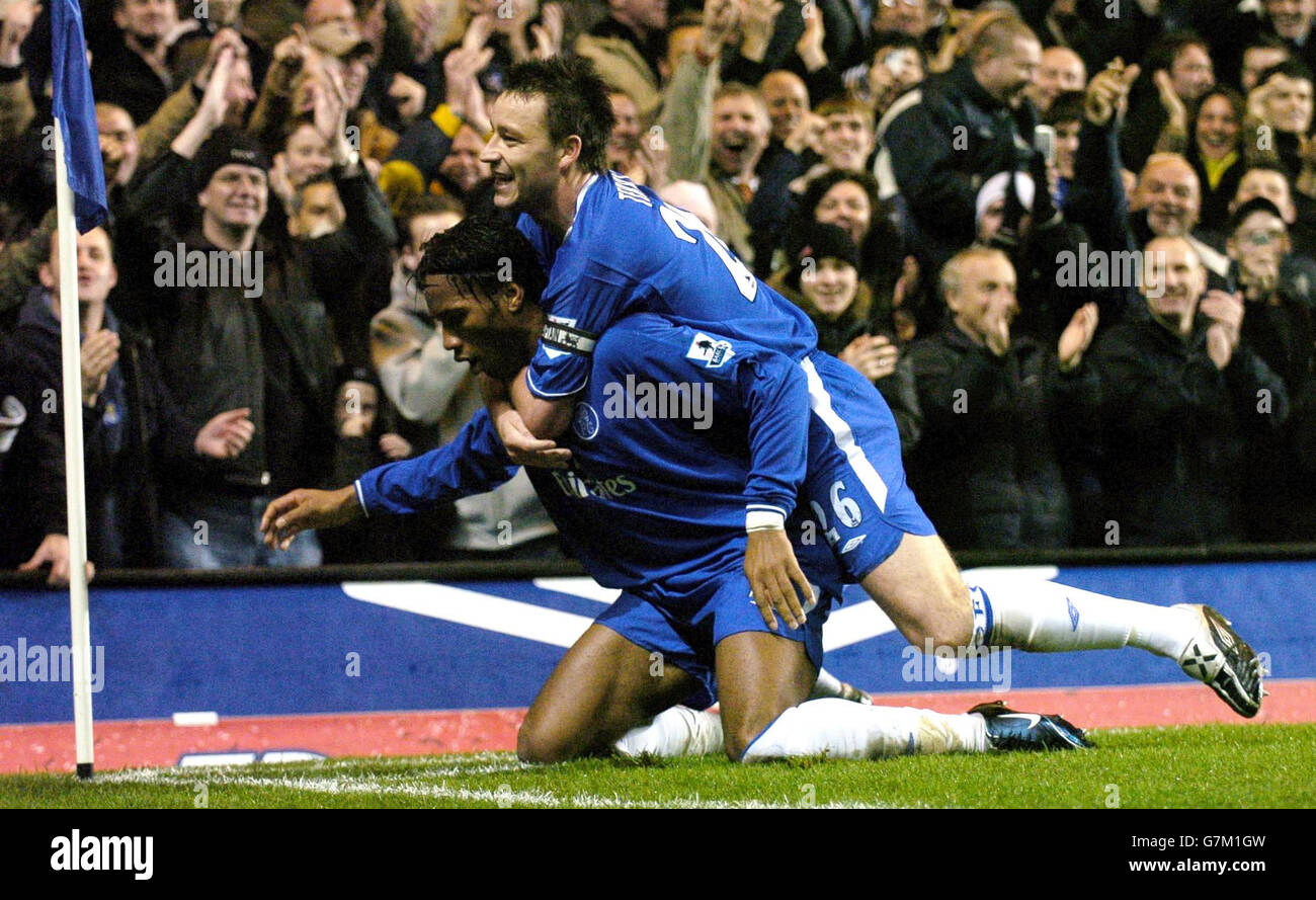 Chelsea's Didier Drogba (left) celebrates with team-mate John Terry ...