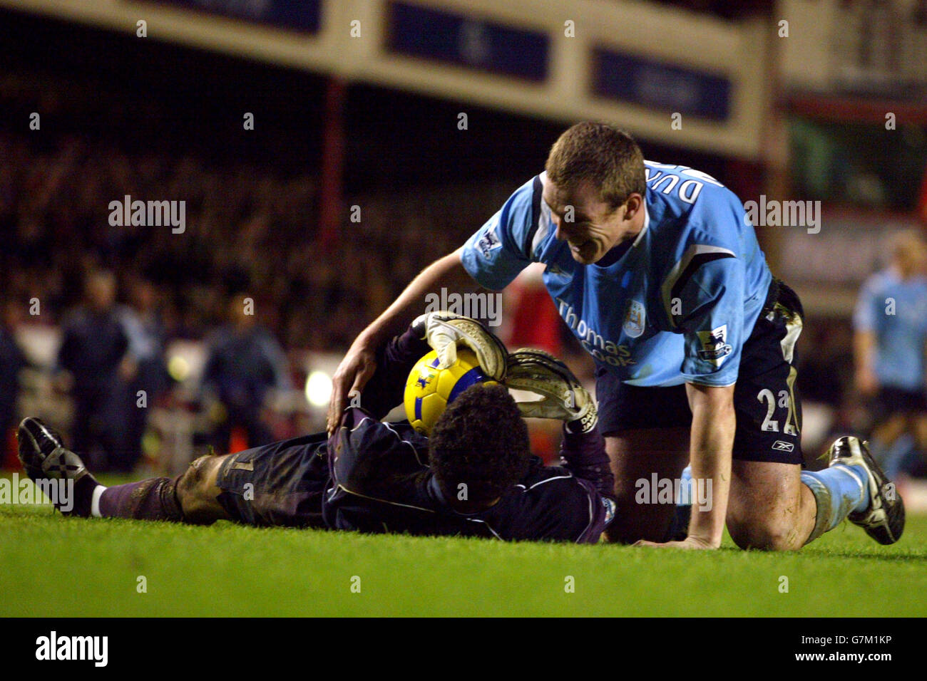 Manchester City's Richard Dunne shares a joke with goalkeeper David ...