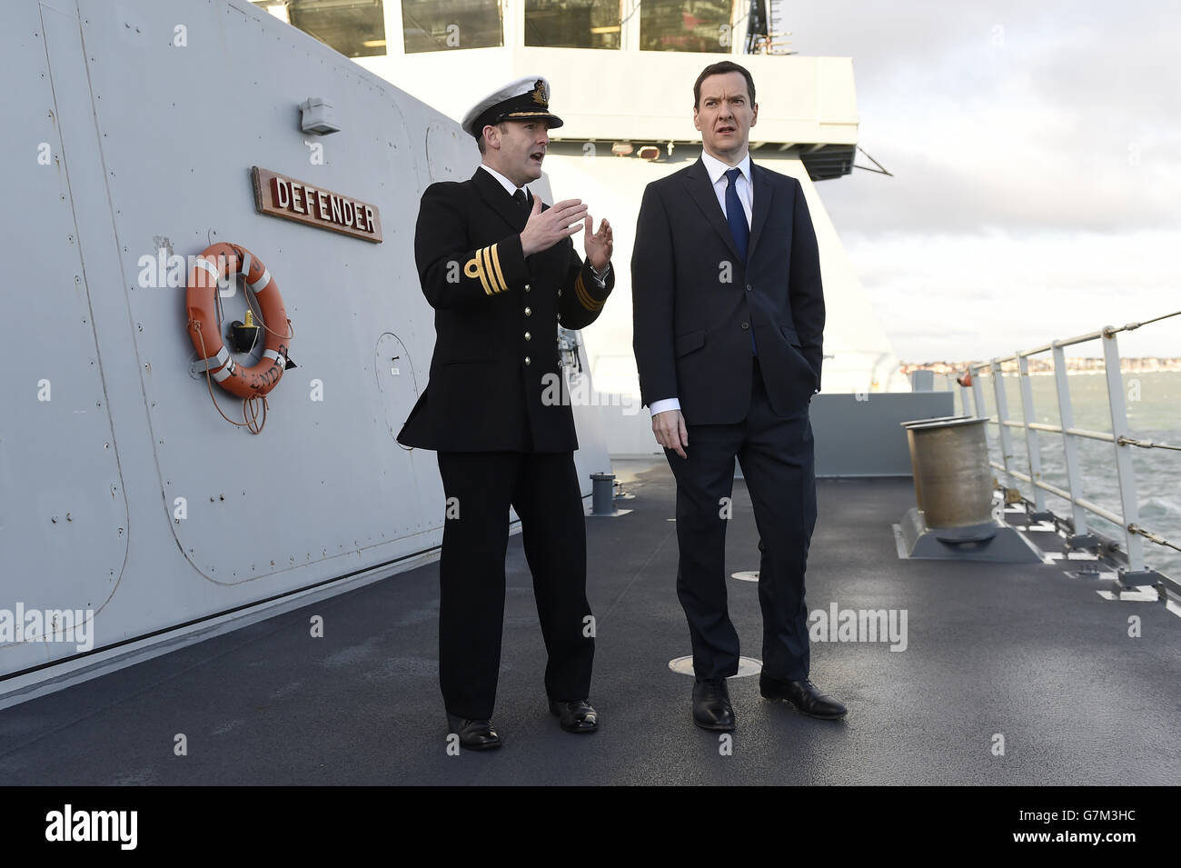 Chancellor George Osborne (right) is shown around HMS Defender by ...
