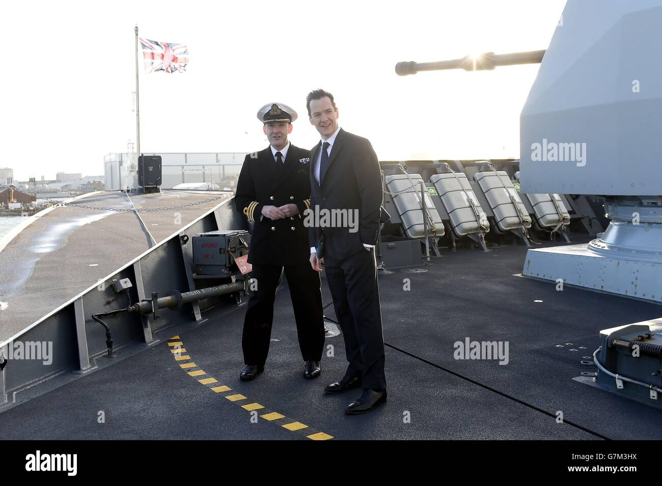 Chancellor George Osborne (right) is shown around HMS Defender by ...