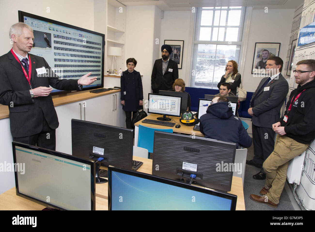 Bruce Royle (left) introduces the facilities at the unveiling of ...