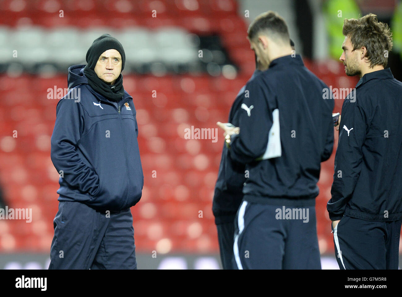 Cambridge United manager Richard Money looks around the stadium with ...