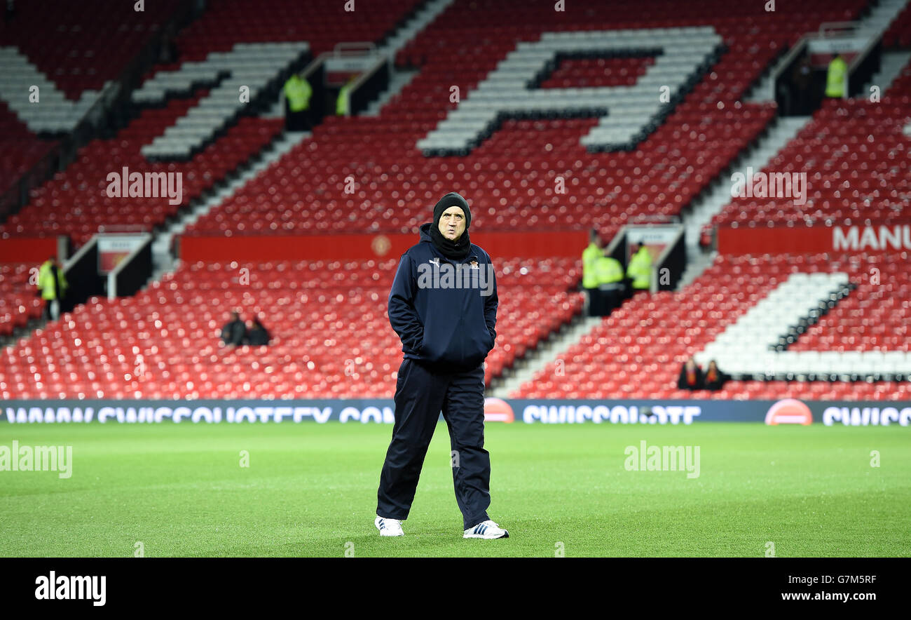 Cambridge United manager Richard Money looks around the stadium before ...