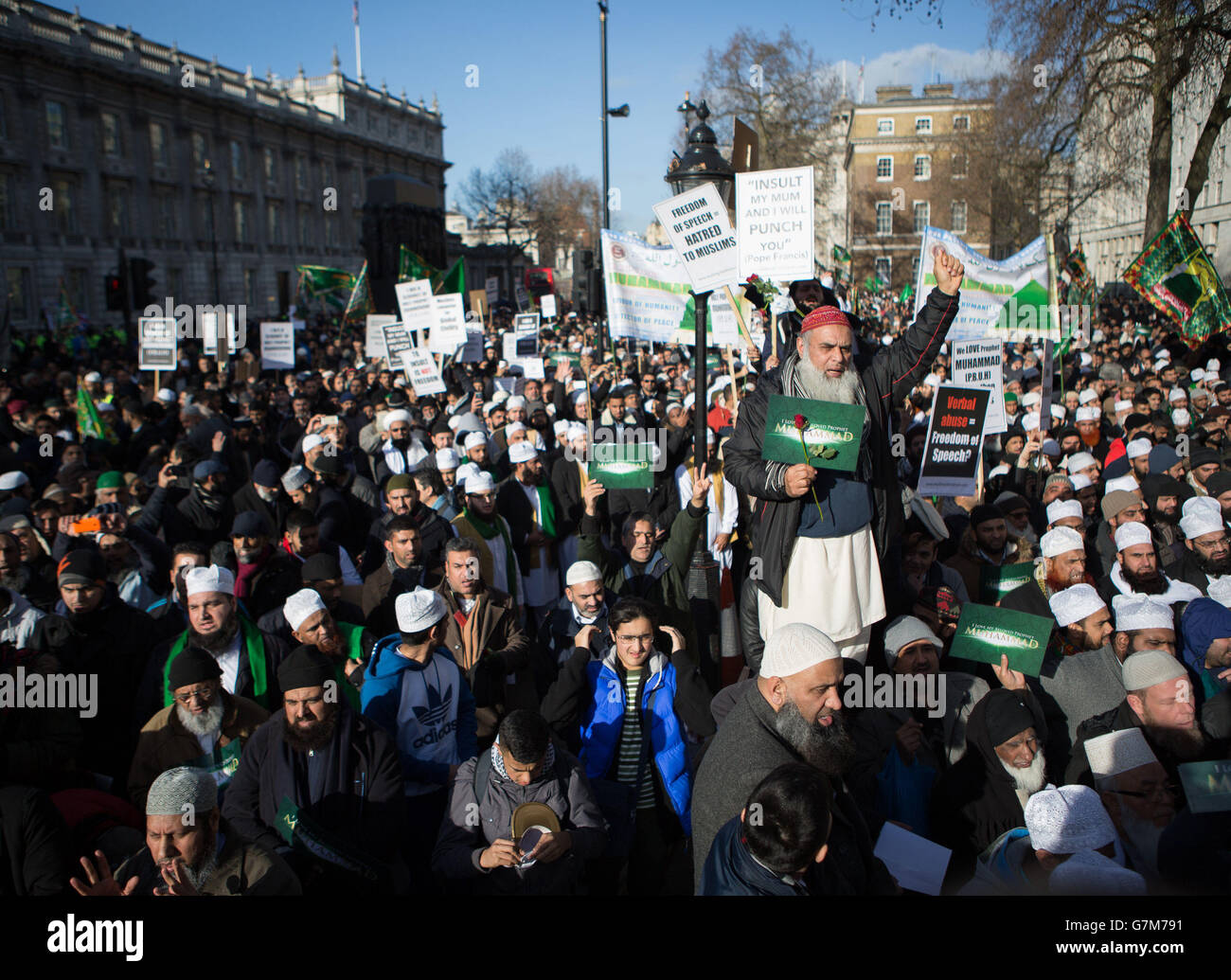 Thousands of Muslims gather together in a demonstration in front of ...