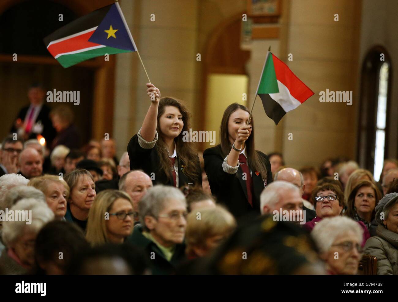 National flags are waved during the National Mass at St Columbkilles RC ...