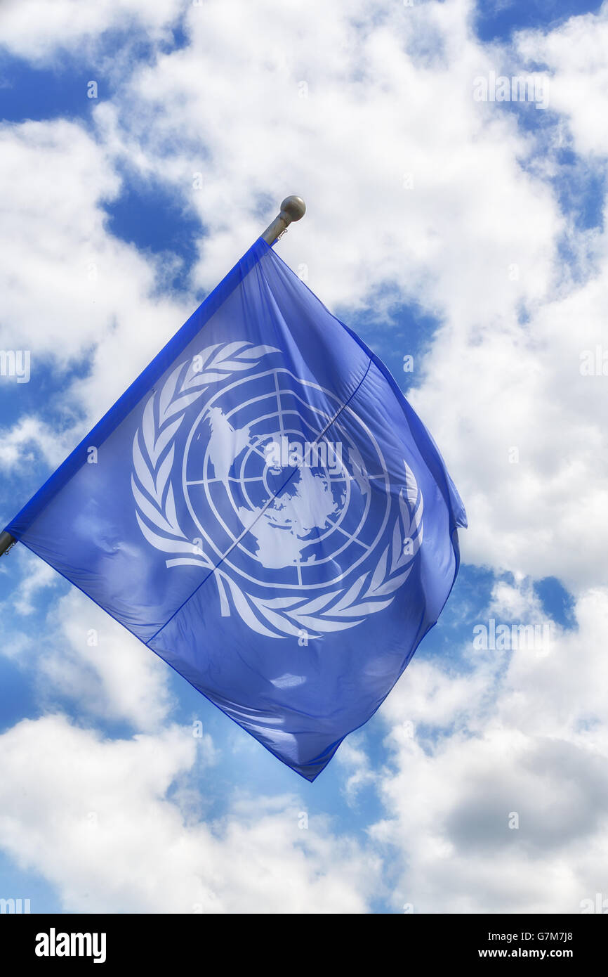 United Nations Flag Flying In Blue Sky High Resolution Stock ...
