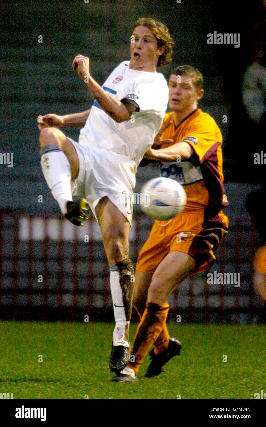 Motherwell's Martyn Corrigan and Aberdeen's Chris Clarke battle for the ...