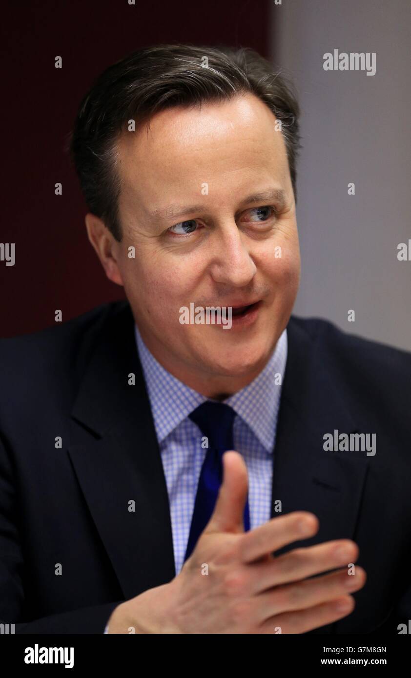 Prime Minister David Cameron meets staff during a visit to Dovetail ...