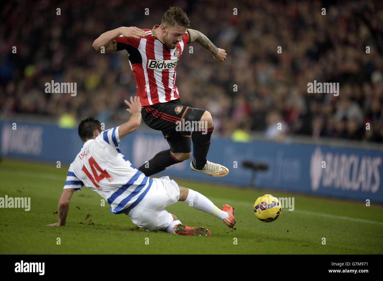 Sunderland's Connor Wickham and Queens Park Rangers' Mauricio Isla ...
