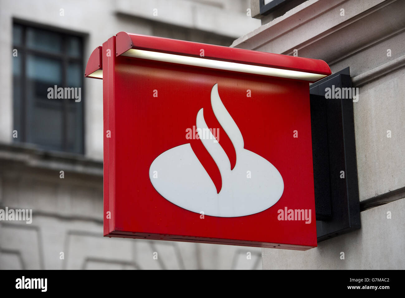 A Santander Bank sign hangs above a branch, London Stock Photo - Alamy