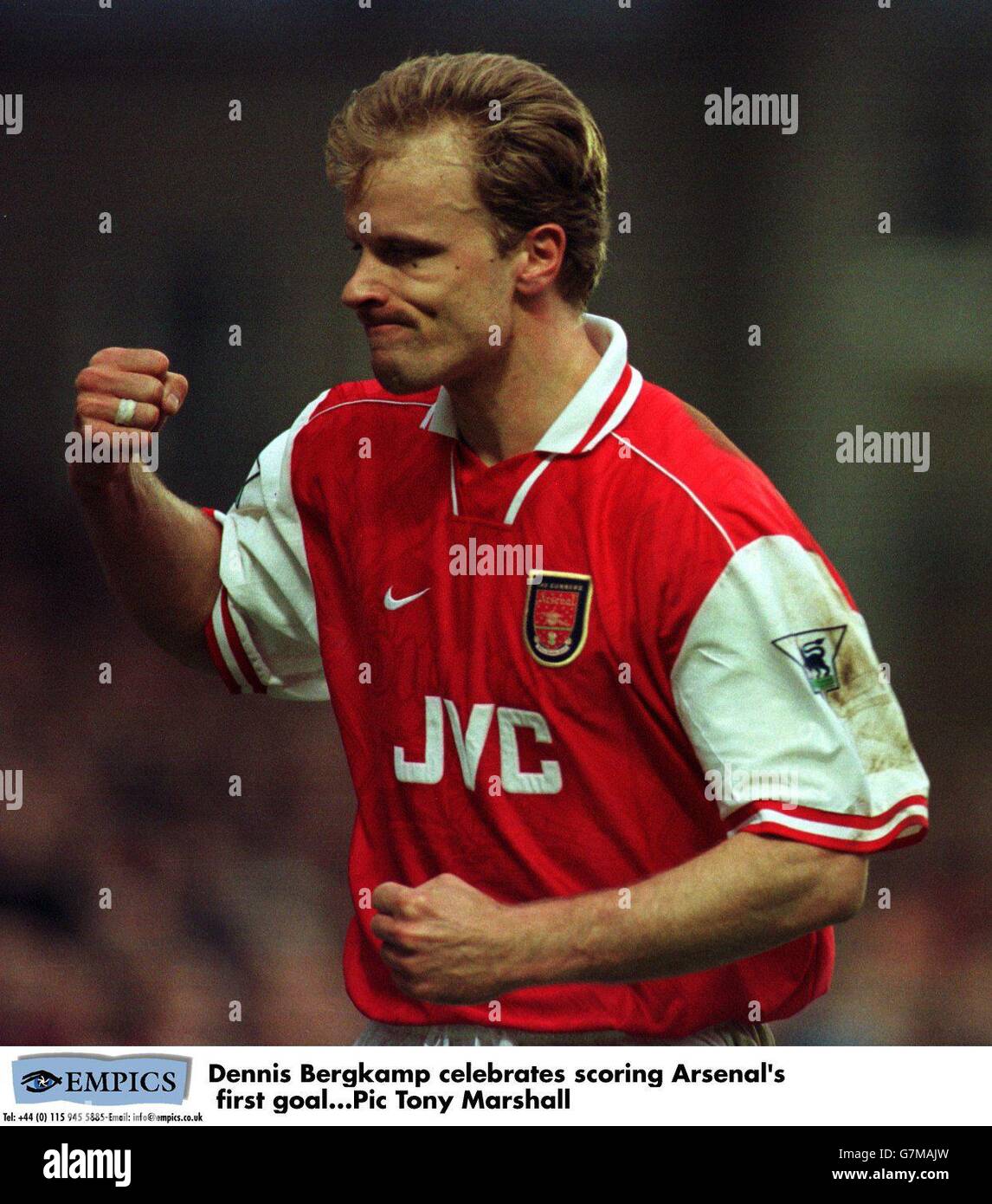 Dennis Bergkamp celebrates scoring Arsenal's first goal Stock Photo - Alamy
